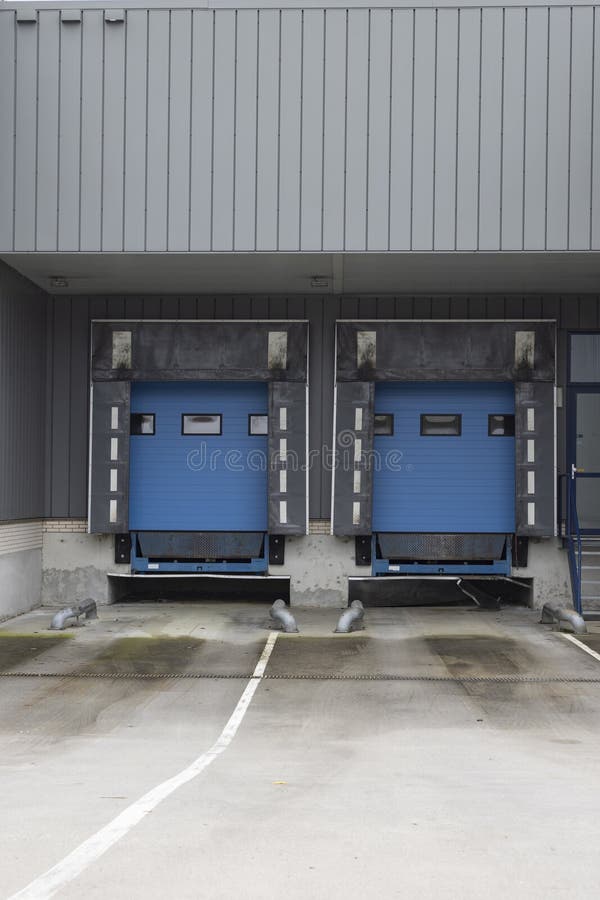 Loading docks of warehouse stock image. Image of goods - 308213033
