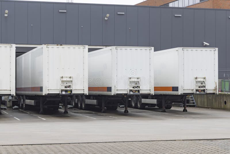 Loading docks of warehouse stock image. Image of business - 308213053