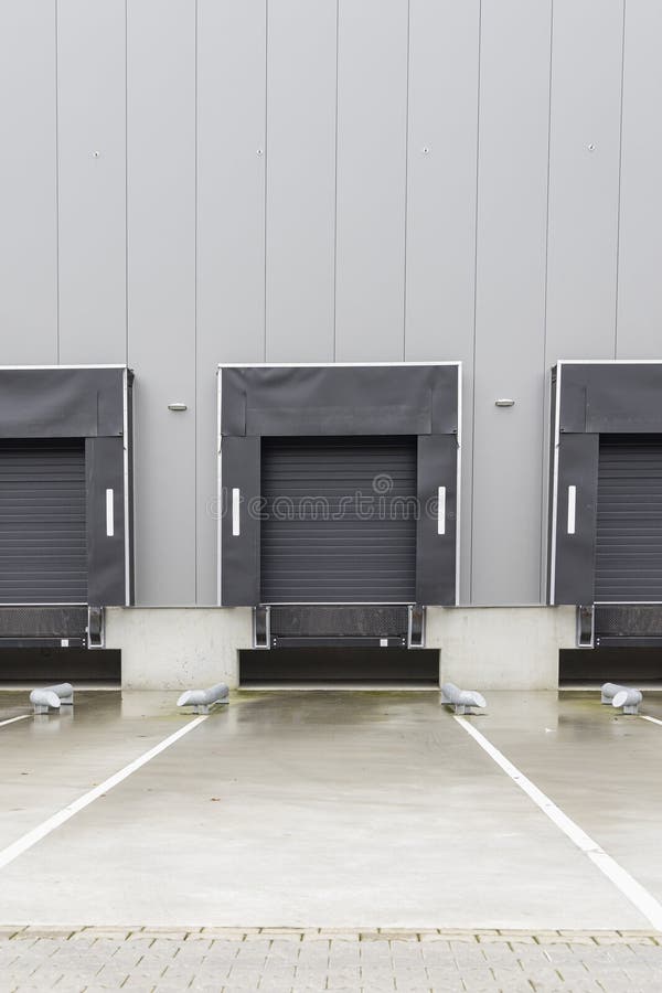 Loading docks of warehouse stock image. Image of distribution - 308212505