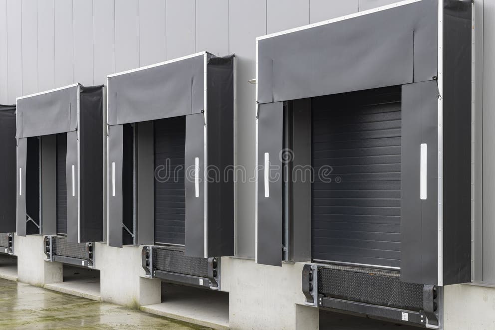Loading docks of warehouse stock photo. Image of shipping - 308212630