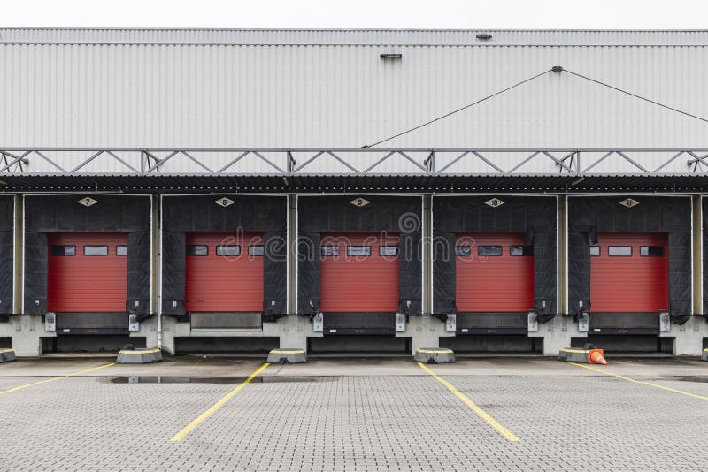 Loading docks of warehouse stock image. Image of business - 308212789