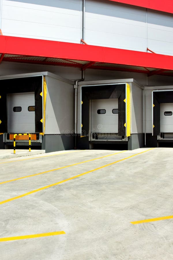 Loading Doors Warehouse stock image. Image of asphalt - 109836381