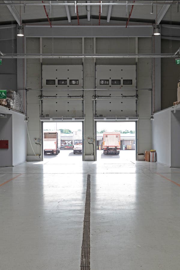 Loading Doors Warehouse stock image. Image of garage - 191414697