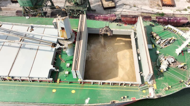 Loading Dry Cargo Ship of Wheat by Cranes in Port. Aerial View Loading ... Loading Dry Cargo Ship of Wheat by Cranes in Port. Aerial View Loading ...