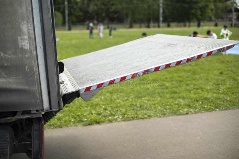 Loading Elevator in a Truck. Opening a Loading Platform in Transport ...