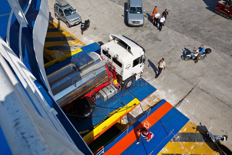 Loading a ferry. editorial photography. Image of cars - 60853207