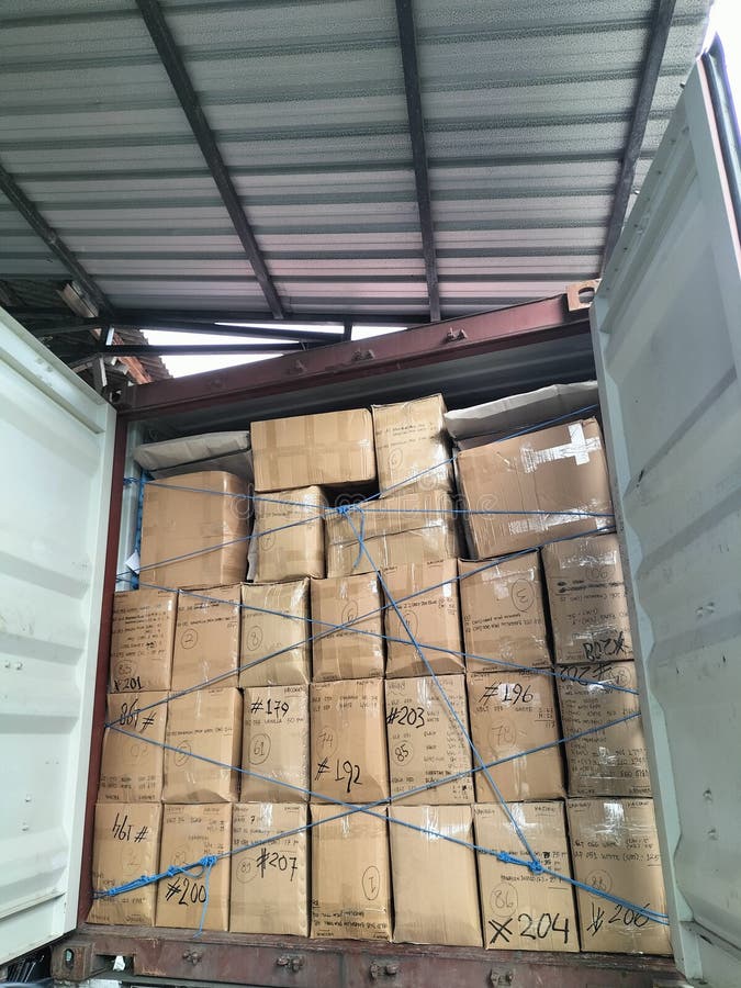 Loading goods in container stock photo. Image of architecture - 264393960