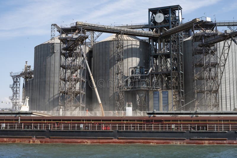 Loading Grain on a Ship in the Port. View from the River To the Port ...
