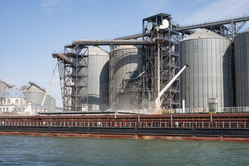 Loading Grain on a Ship in the Port. View from the River To the Port ...