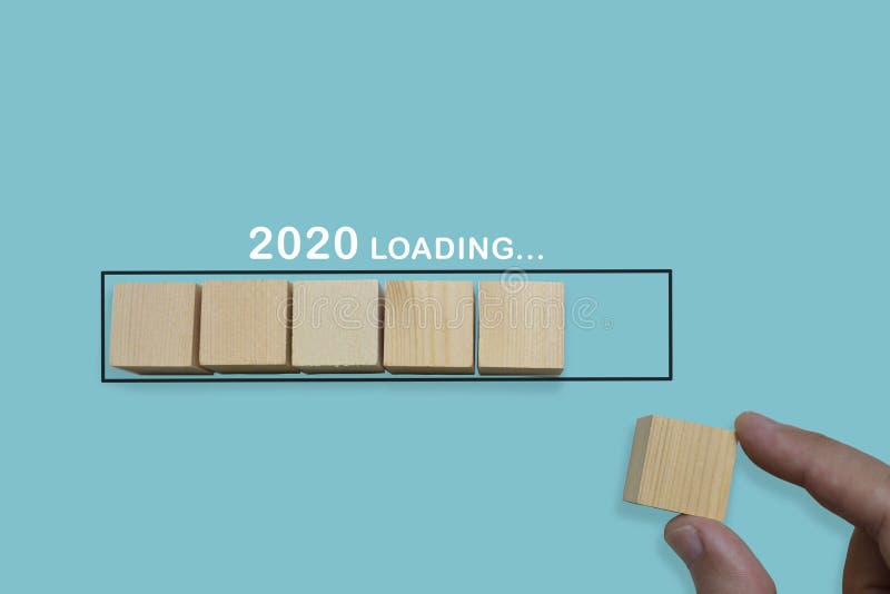 Loading 2020, Hand Putting Wood Cube in Progress Bar Stock Image ...