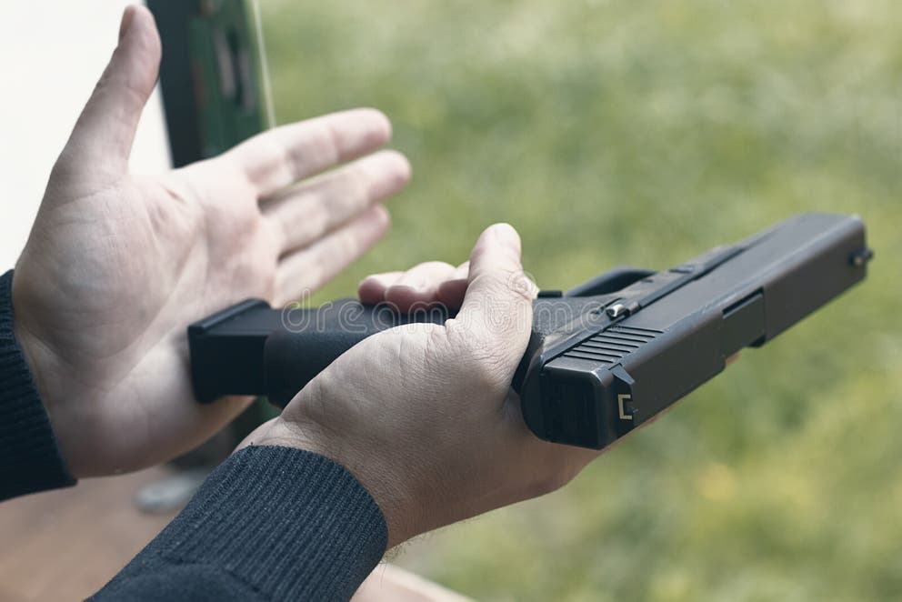 Loading Handgun. Reloading Handgun Stock Image - Image of military ...