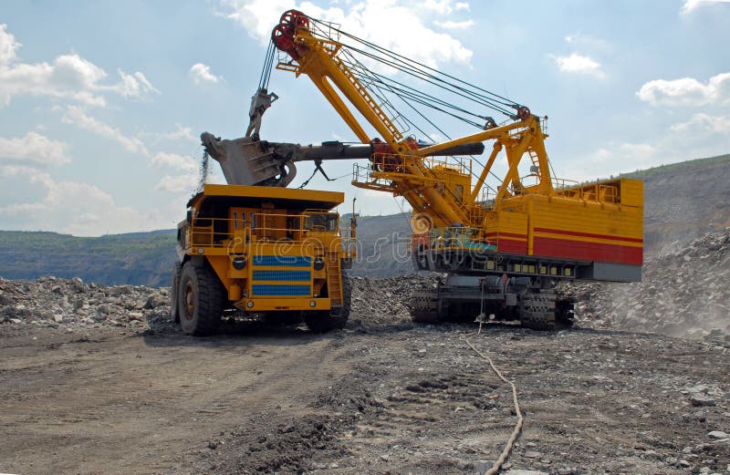 Loading of iron ore stock photo. Image of open, digger - 13253606