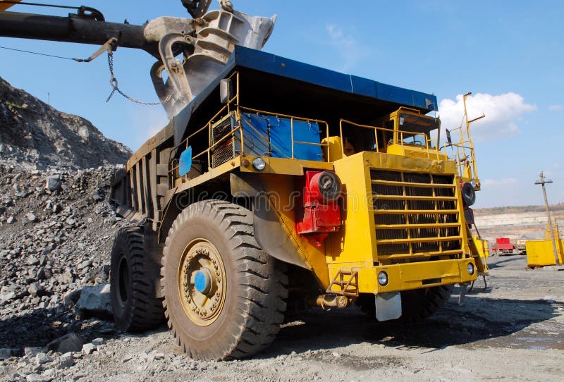Loading of iron ore stock image. Image of navvy, large - 12831113