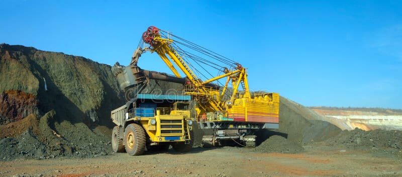 Loading of iron ore stock photo. Image of machinery, industry - 10868210