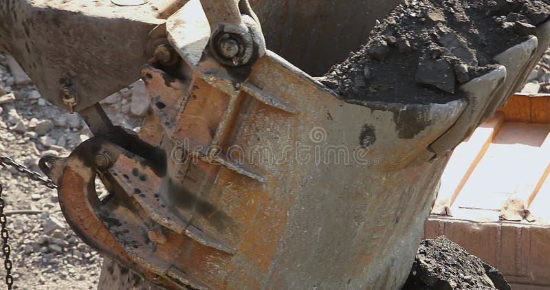 Bucket Of A Mining Excavator Close Up Loading Iron Ore Into A Mining Excavator Close Up Stock