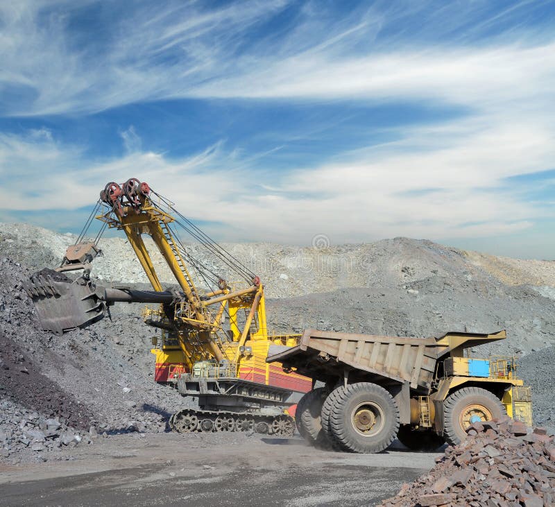 Loading of iron ore stock image. Image of machinery, trucks - 32440115
