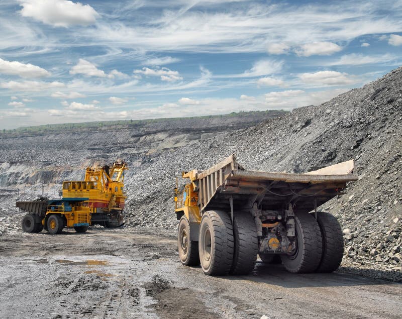 Loading Iron Ore In Container By Bucket On Metallurgy Heavy Industry ...