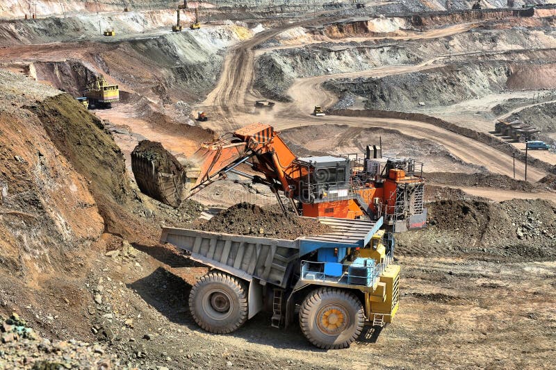 Loading of iron ore stock photo. Image of dredger, minerals - 31775904