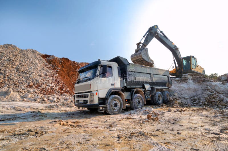 Loading a Large Lorry Building Material Stock Photo - Image of stones ...