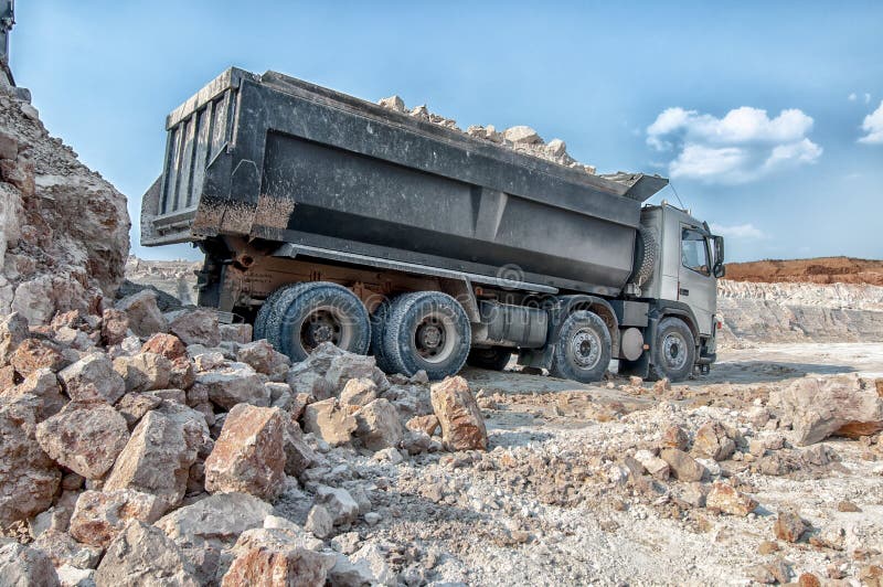 Loading a Large Lorry Building Material Stock Photo - Image of road ...