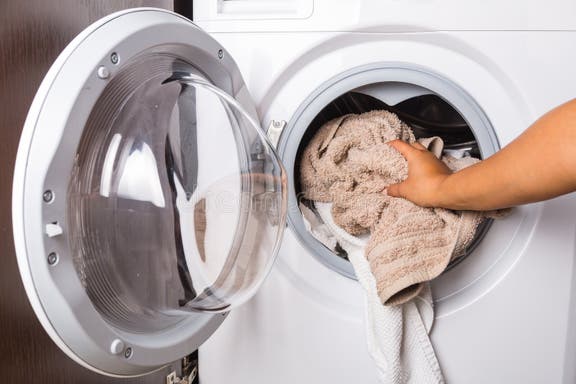 Loading Laundry To the Washing Machine Stock Image - Image of detergent ...