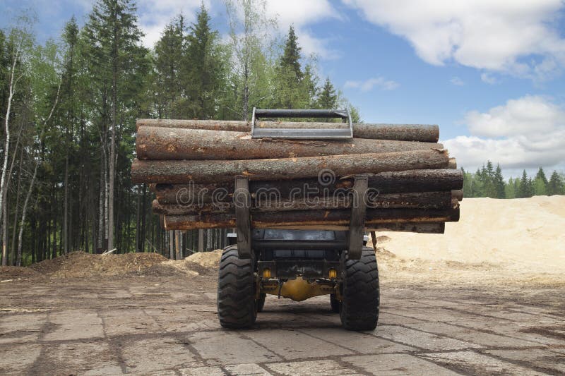 Loading Logs with a Special Loader.Timber Products Warehouse on a ...