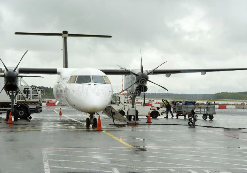 Loading Luggage on the Plane at the Airport Stock Image - Image of ...