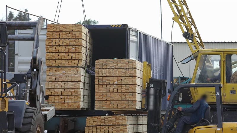 Loading Lumber in Railway Wagon Stock Footage - Video of loading ...