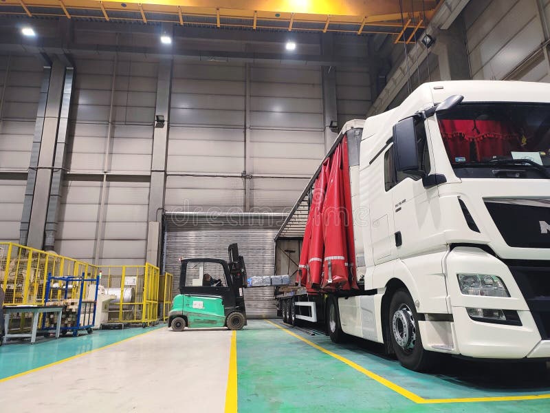 Loading Material into a Truck in a Factory Stock Image - Image of ...