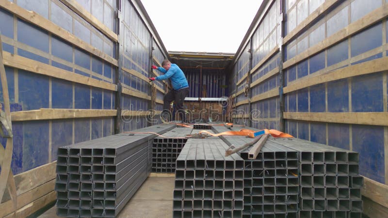 Loading Metal into a Truck stock video. Video of trailer - 235967637