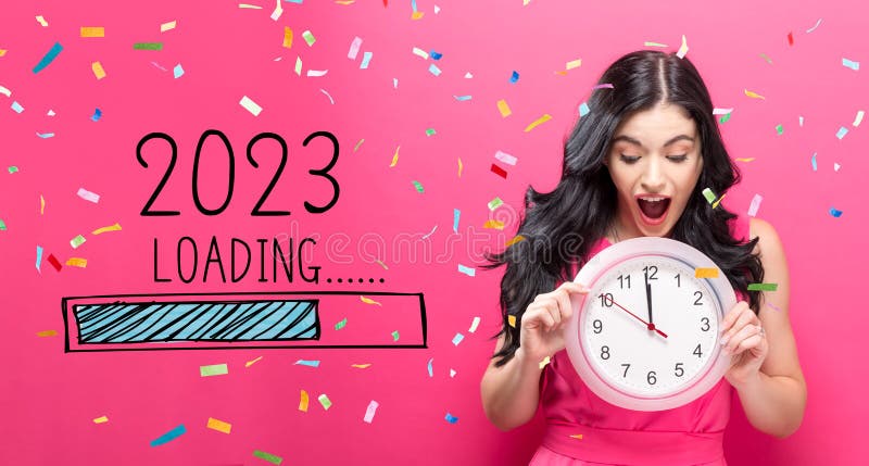 Loading New Year 2023 with Young Woman Holding a Clock Stock Photo ...