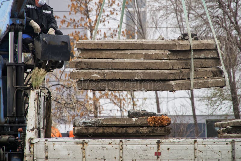 Loading Old Concrete Slabs into a Truck Body Using a Pneumatic ...