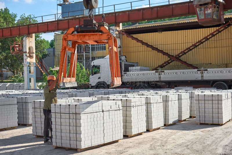 Loading Pallets with White Brick on a Truck with a Long Body. Stock ...