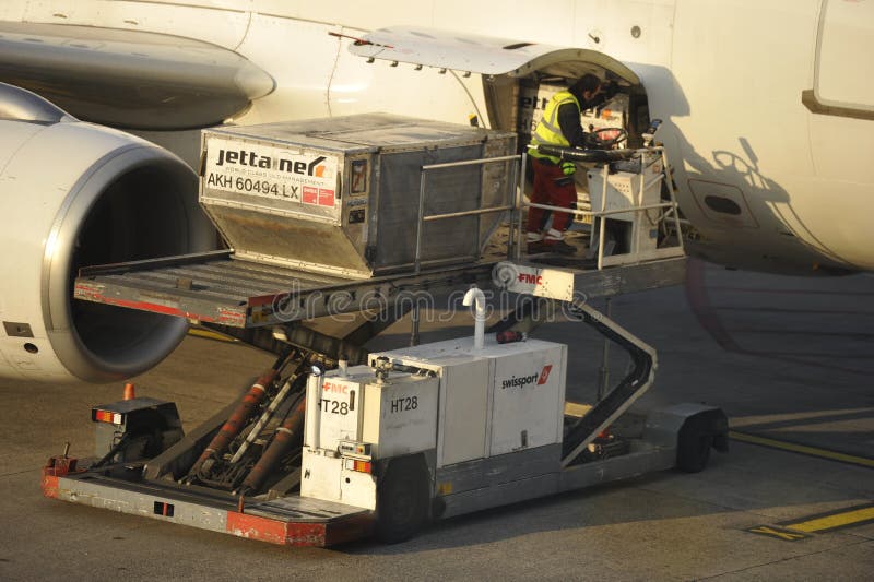 Loading the Plane editorial photo. Image of hoisting - 31344036