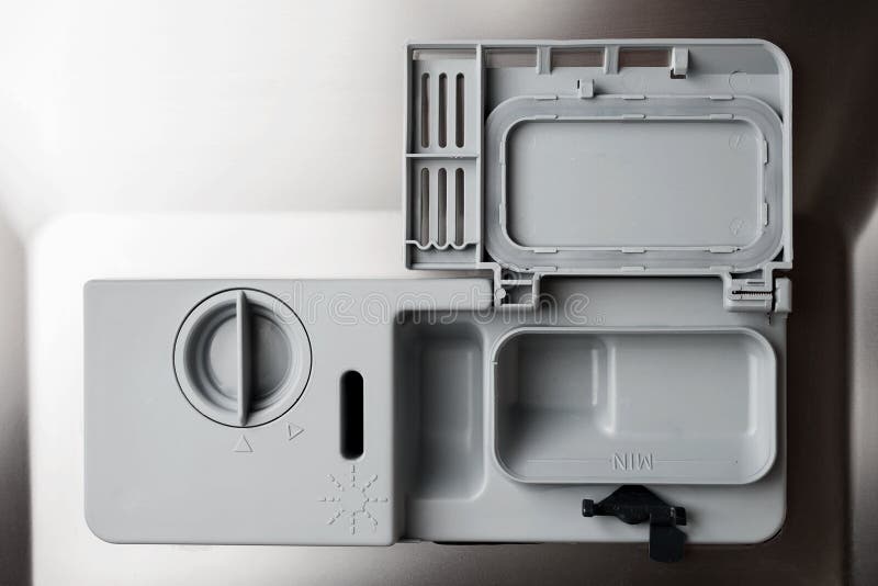 Loading of Powder, Salt and Conditioner into the Washing Machine Stock ...