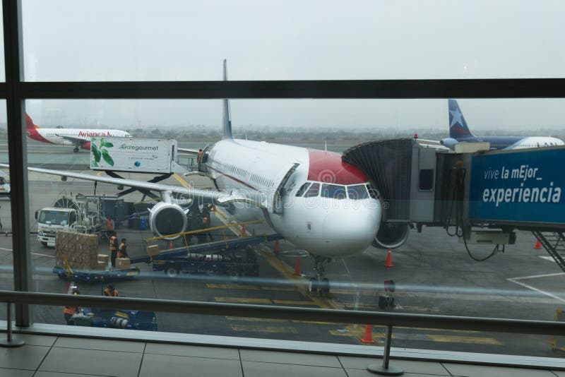 Loading and Preparing an Airplane Editorial Stock Photo - Image of ...