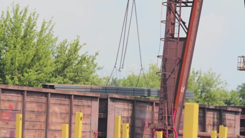 Loading of a Profile Pipe by a Gantry Crane into a Freight Car, Loads ...