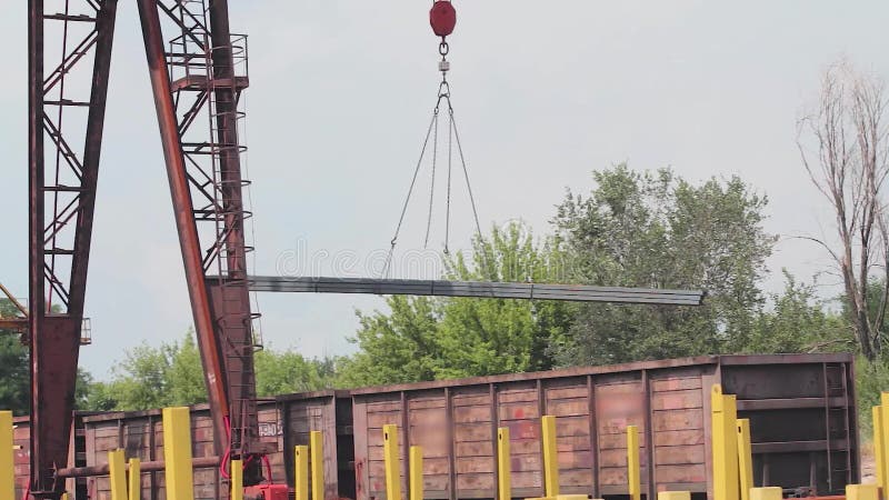 Loading of a Profile Pipe by a Gantry Crane into a Freight Car, Loads ...