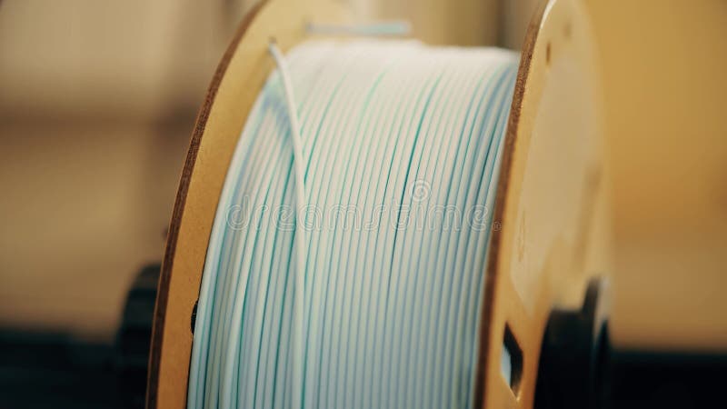 Loading the Recycled Cardboard Roll with Plastic Filament in a Modern ...