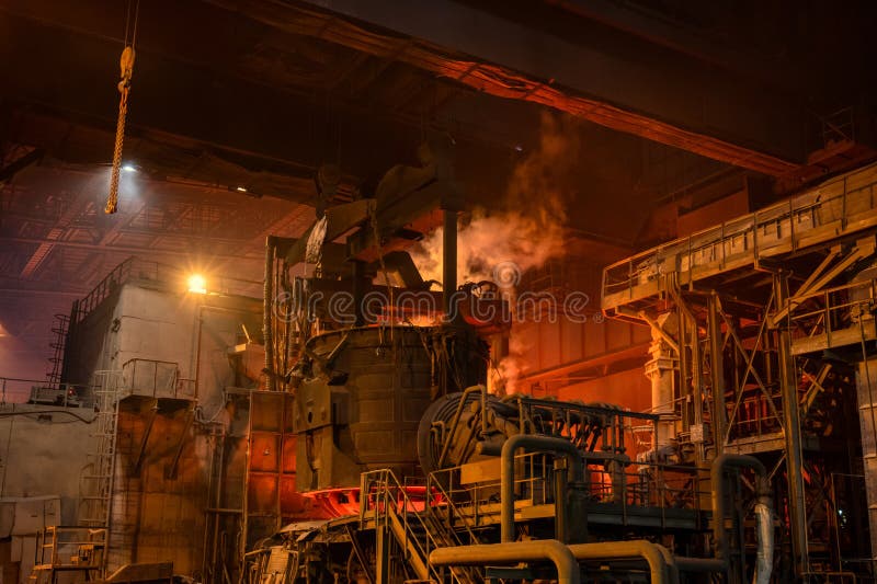 Loading Scrap Metal into Electric Arc Furnace Stock Image - Image of ...