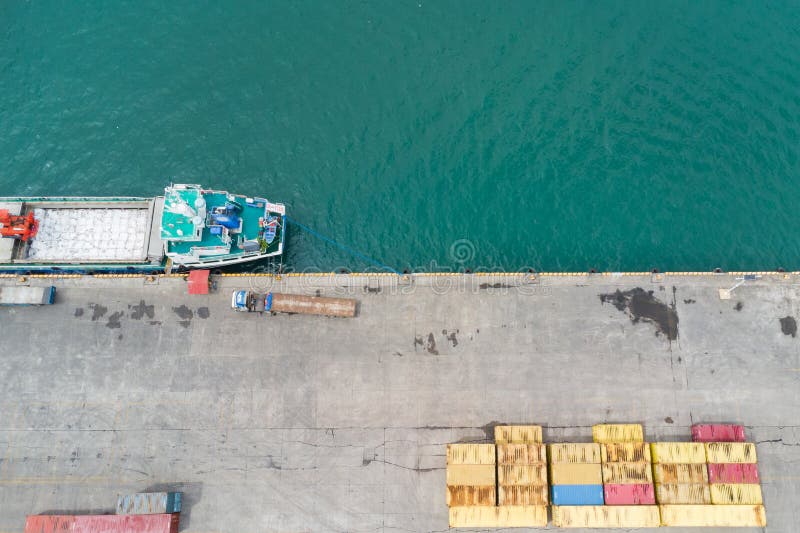 Loading a Ship with Containers at the Port. Sea Cargo Transportation ...