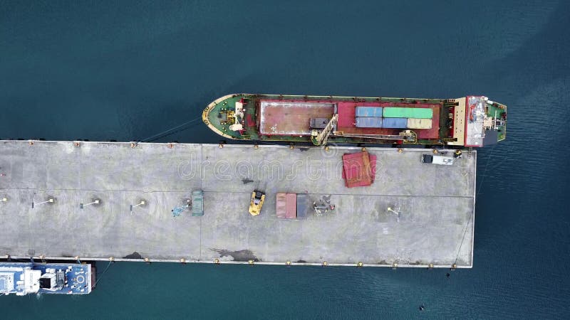 Loading a Ship with Containers at the Port. Sea Cargo Transportation ...