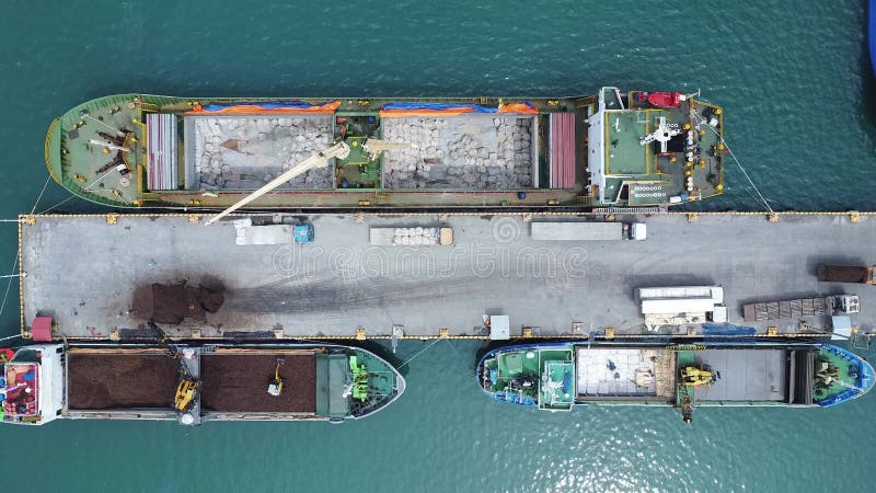 Loading a Ship with Containers at the Port. Sea Cargo Transportation ...