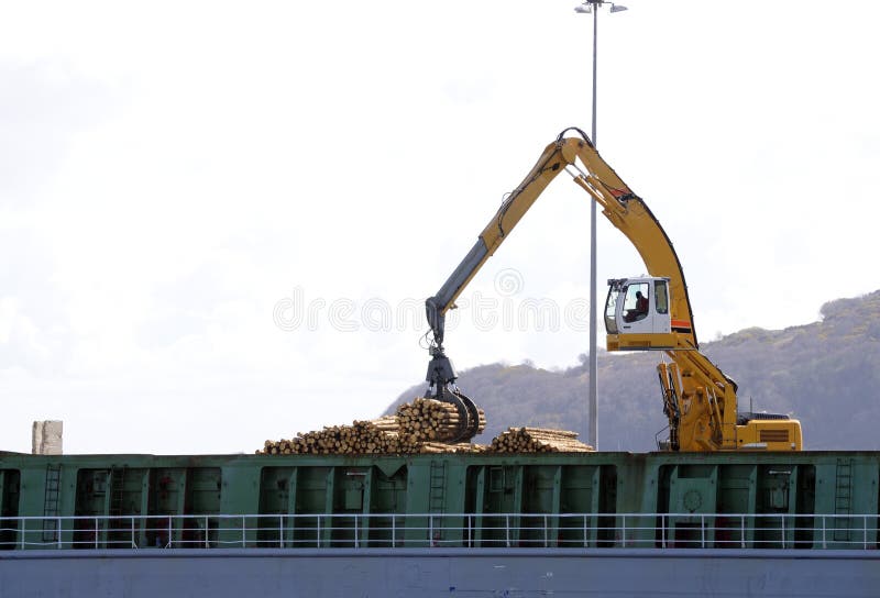 Loading ship with logs stock photo. Image of heavy, ship - 4963612