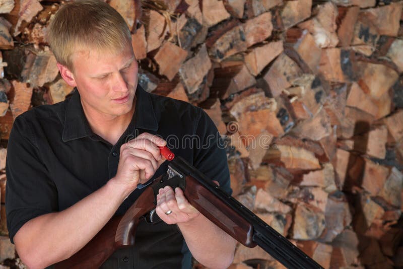 Loading a Shotgun stock photo. Image of shotgun, insert - 26581440