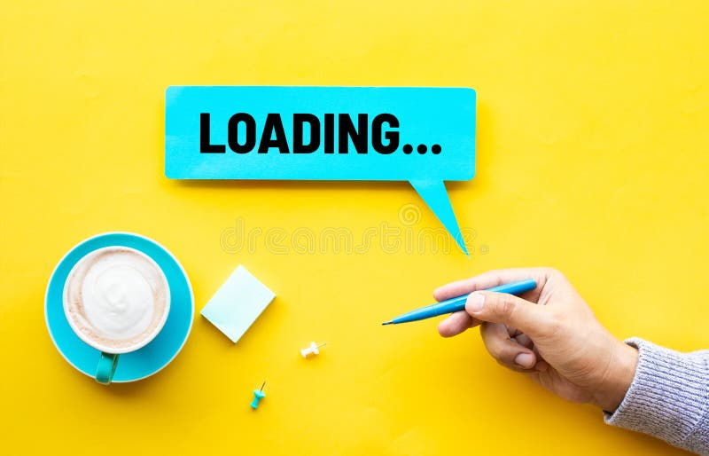 Loading or Sparking Ideas with Person Hand Holding Pen with Text ...