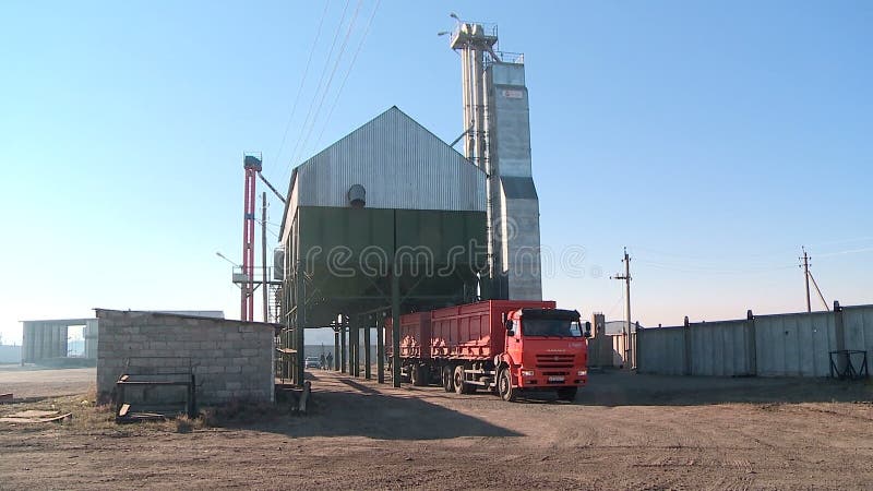 Loading grain into storage stock video. Video of grain - 146474909