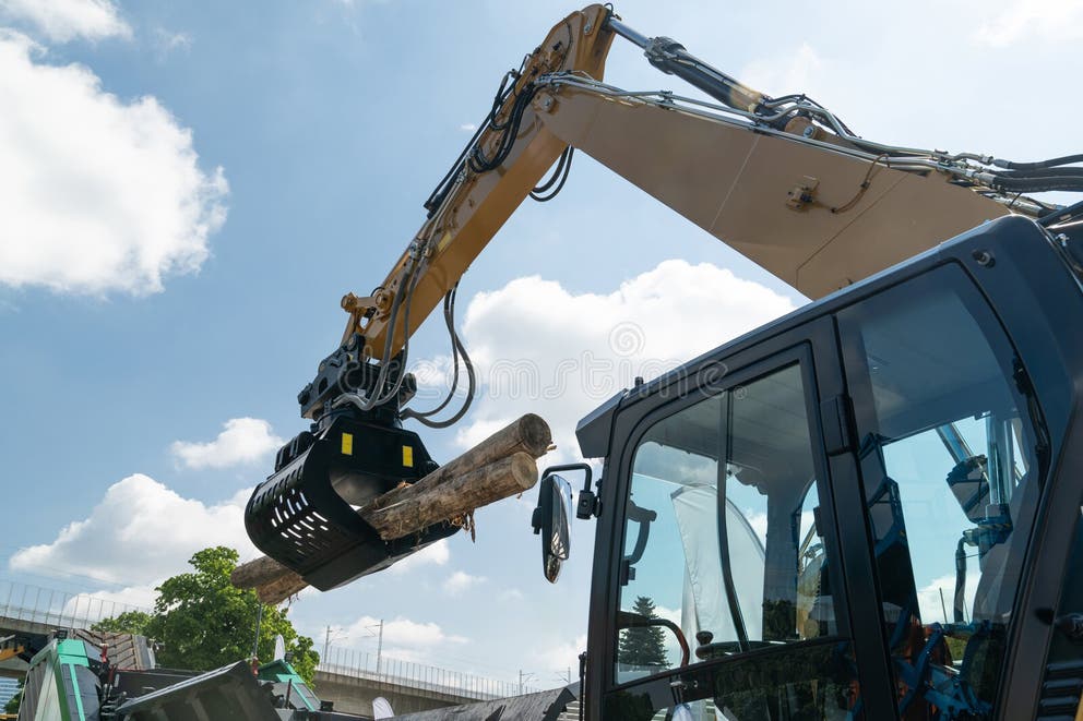 Loading of Timber. Loader Close Up Stock Photo - Image of work, cargo ...