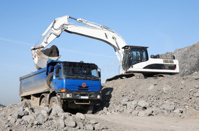 Loading a truck stock image. Image of construction, machine - 9073335