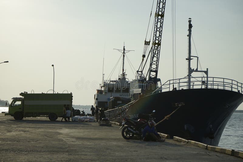 Loading and Unloading Cargo Activity in the Harbour Stock Photo - Image ...